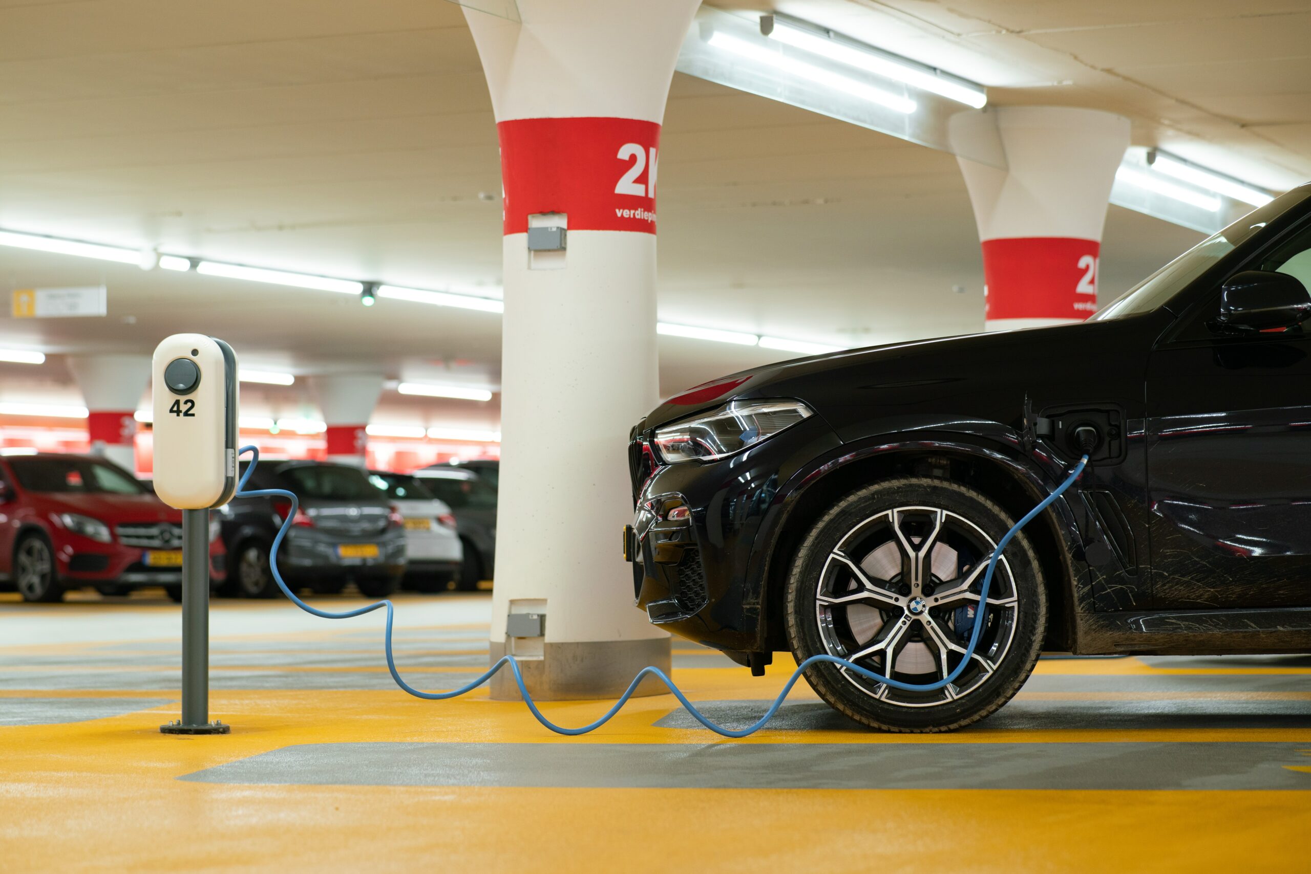 Electric vehicle charging in multi-tenant properties